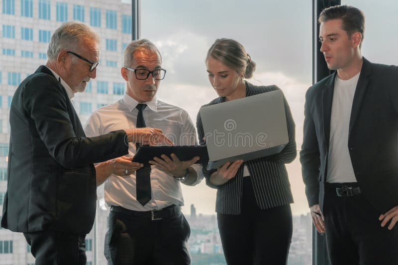 Board Members are in the Meeting while a Asian Businessman Pitching His ...