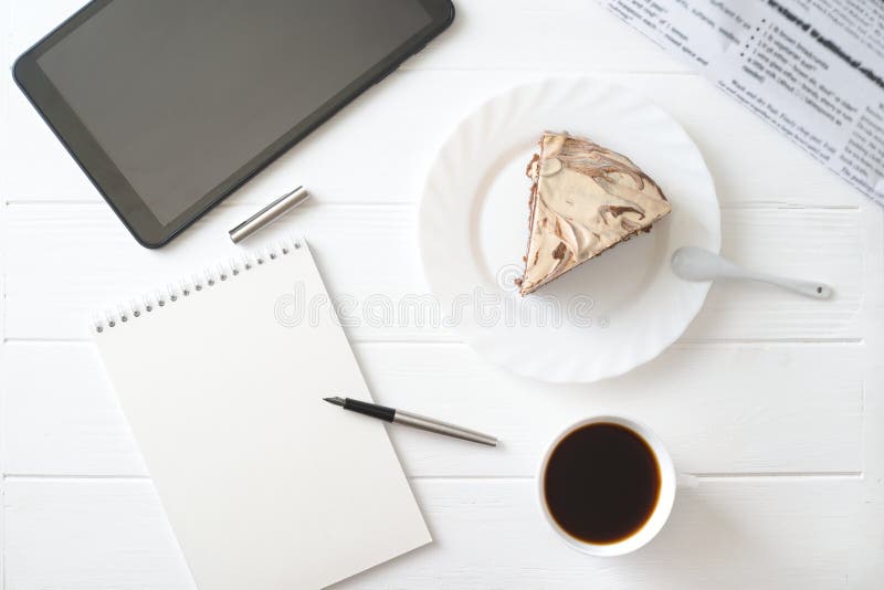 Business Breakfast. on the Table Layout Notebook, Tablet, Coffee, Cake ...