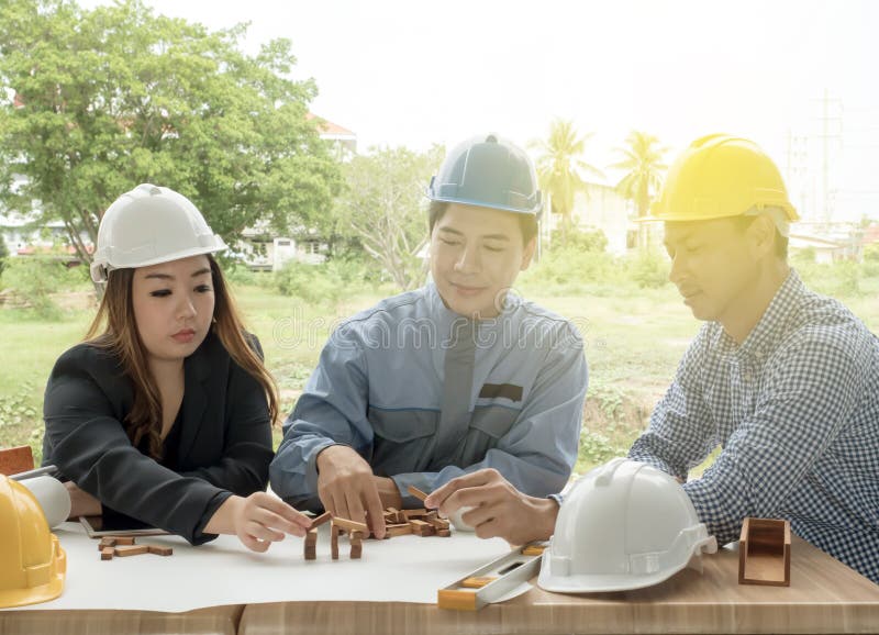 Business, Building, Teamwork and People Concept - Group are Discussing ...