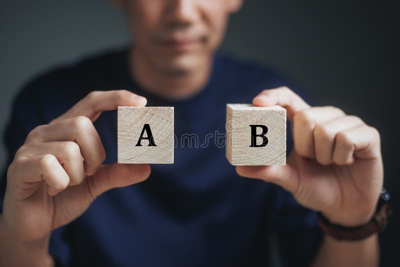 Business Choices for Difficult Situations, a or B, Man Holding Two ...