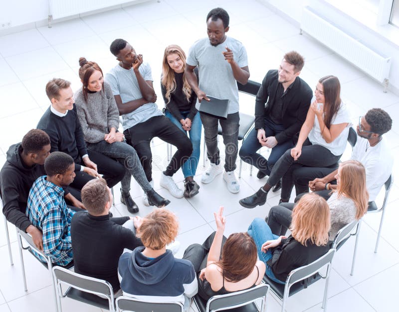 Business Coach Conducts a Seminar for a Group of Young People Stock ...
