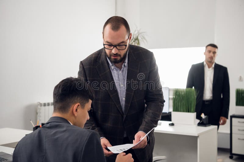 The Business Coach Instructs Trainees in a Spacious Office. Training of ...