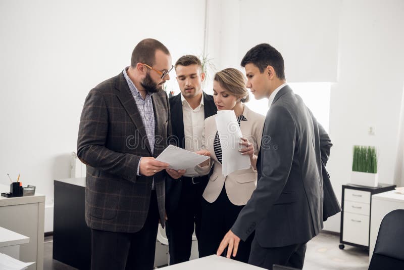 The Business Coach Instructs Trainees in a Spacious Office. Training of ...