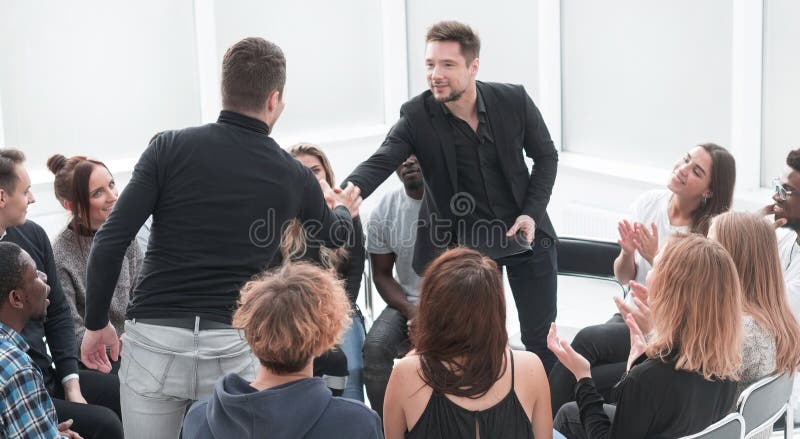 Business Coach Shaking Hands with a Seminar Participant Stock Image ...