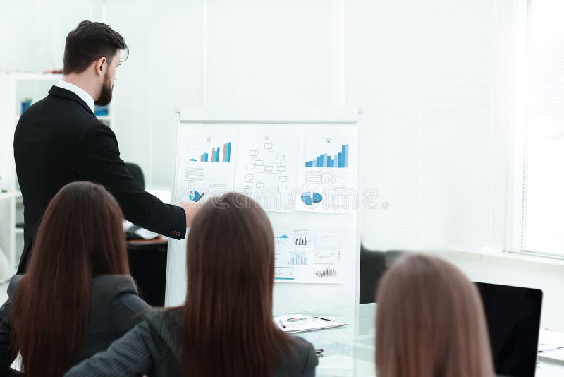 Business Coach Teaching Employees on Whiteboard at Corporate Training ...