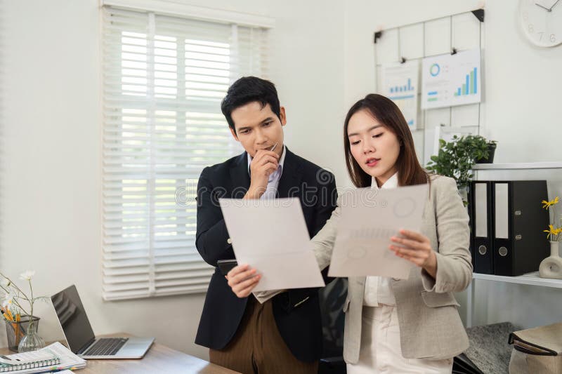 Business Collaboration and Strategy. Professionals Analyzing Project ...