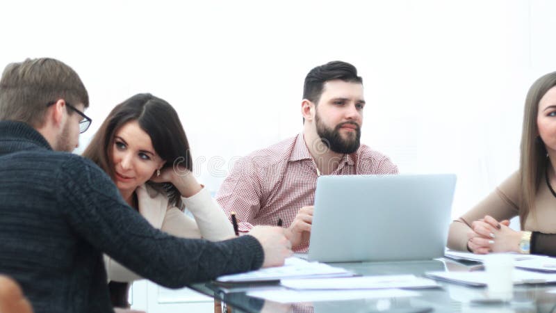 Business Colleagues Discuss Financial Data Sitting at the Desk Stock ...