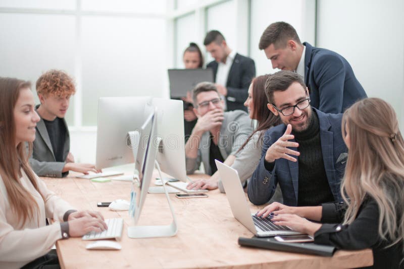 Business Colleagues Discussing Work Issues in the Workplace. Stock ...