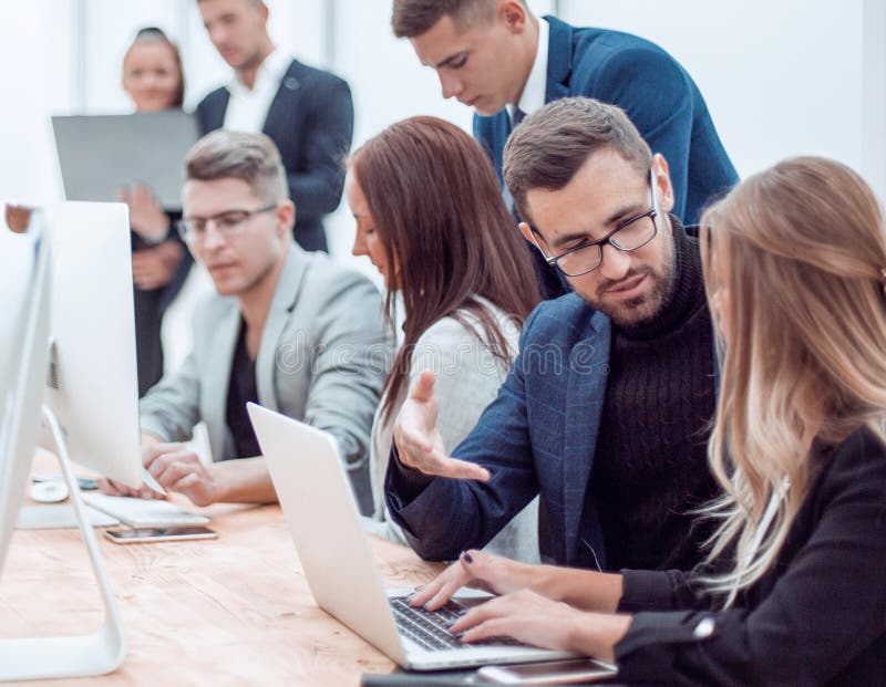 Business Colleagues Discussing Work Issues in the Workplace. Stock ...