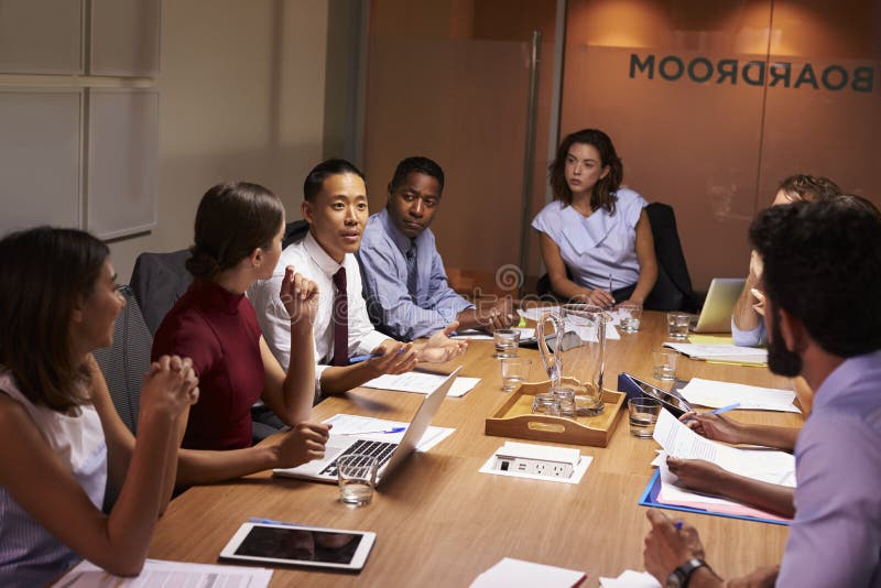 Discussion In The Boardroom Stock Photo - Image of presentation, suit ...