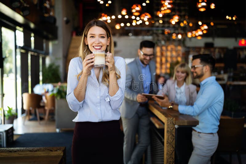 Business Colleagues Having Conversation during Coffee Break Stock Photo ...