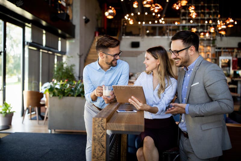 Business Colleagues Having Conversation during Coffee Break Stock Photo ...