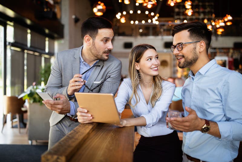 Business Colleagues Having Conversation during Coffee Break Stock Photo ...