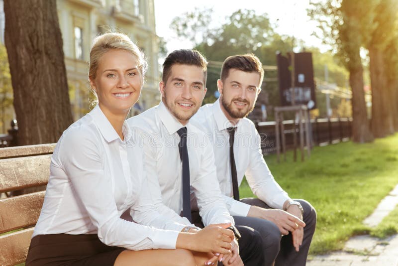 Business Colleagues Resting in City Park Stock Image - Image of group ...