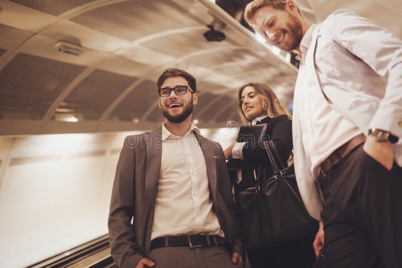 Business Colleagues Taking Subway after Work Stock Photo - Image of ...
