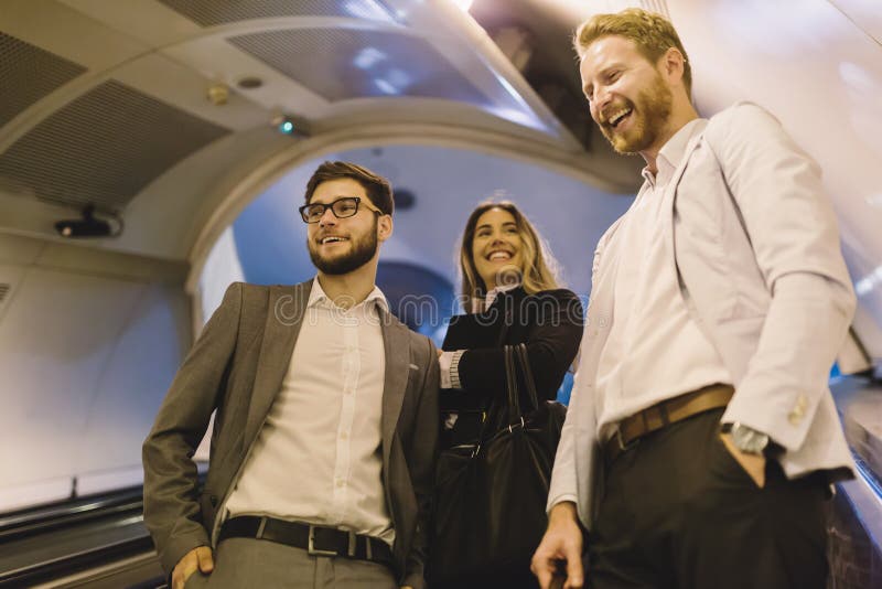Business Colleagues Taking Subway after Work Stock Photo - Image of ...