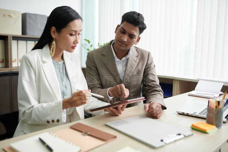 Business Colleagues Signing Agreement Stock Image - Image of desk ...