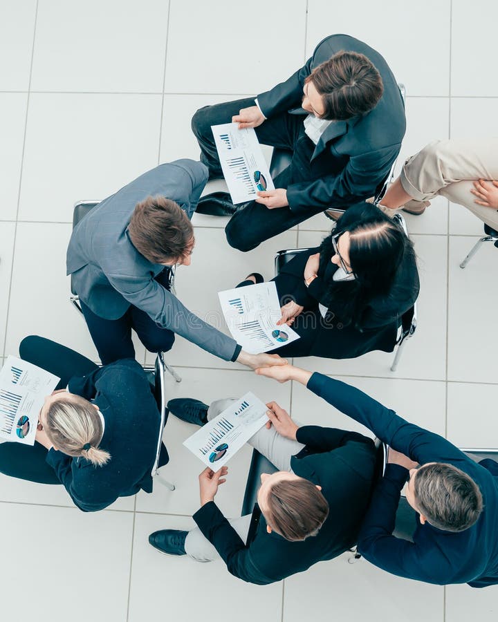 Business Colleagues Supporting Each Other with a Handshake. Stock Image ...