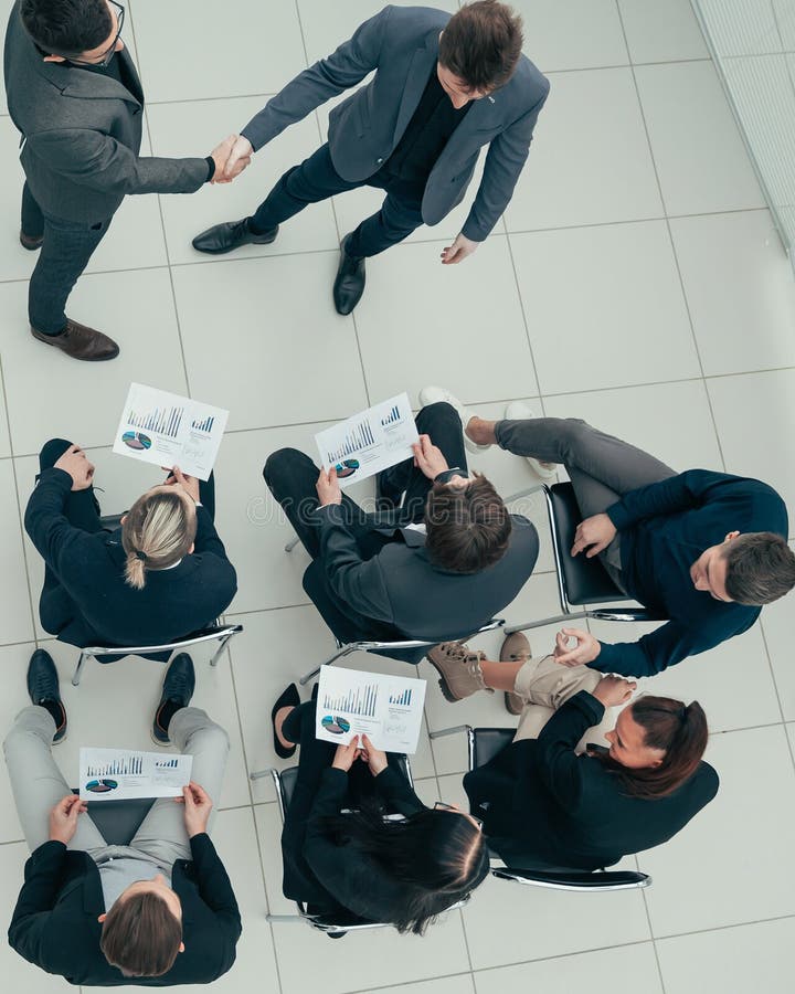 Business Colleagues Supporting Each Other with a Handshake. Stock Photo ...