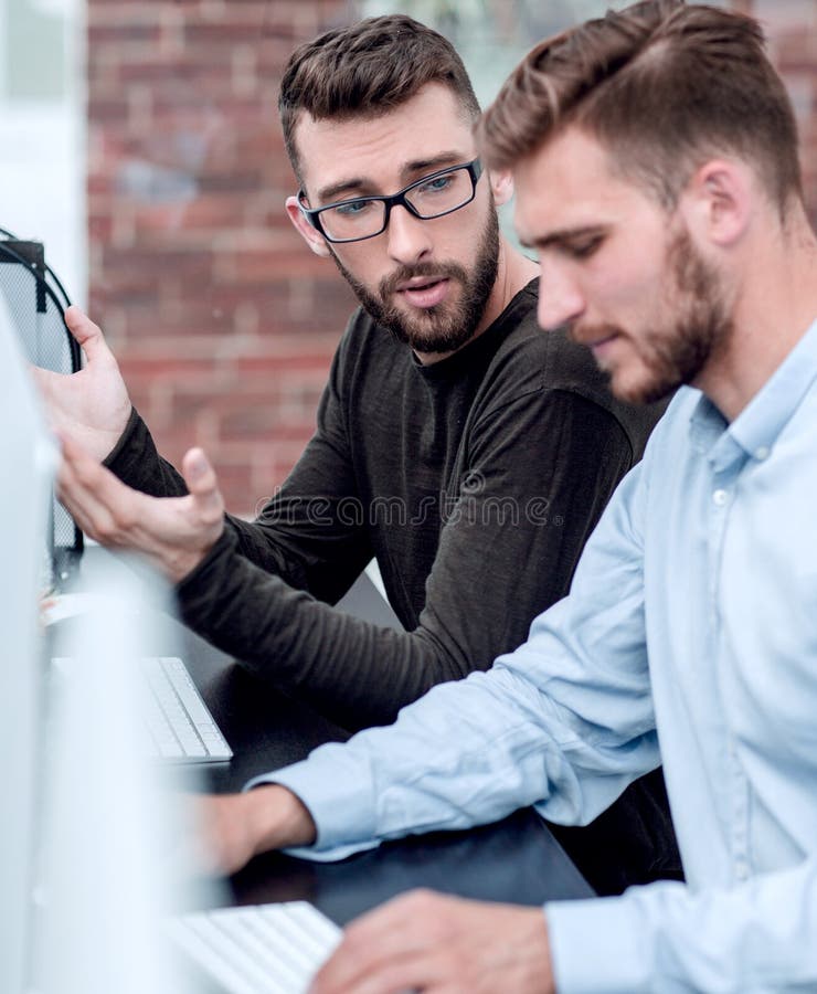 Business Colleagues Talk, Sitting At A Computer Table Stock Image ...
