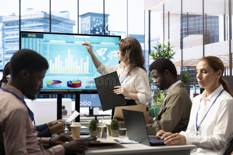 Business Colleagues Team Study Feedback on Old Projects for Future ...