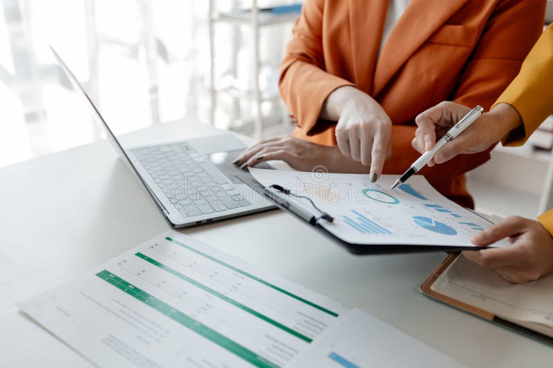 Business Colleagues Working Together on Desktop Computer at Office ...