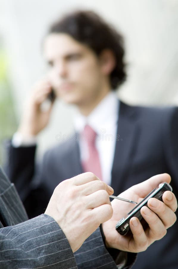 Business Communication Devices Stock Image - Image of suit, mobile: 2190917