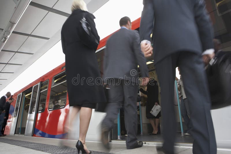 Business Commuters Getting into Train Stock Photo - Image of railroad ...