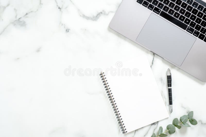 Business Composition with Laptop Computer, Paper Notepad, Pen and ...