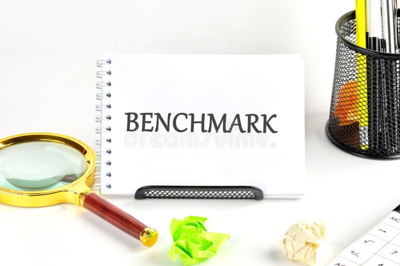 Business Concept of Benchmark. a Word BENCHMARK Written in a Notebook ...