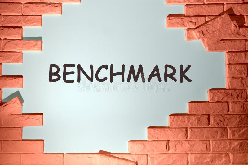 Business Concept of Benchmark. a Word BENCHMARK Written on the Wall ...