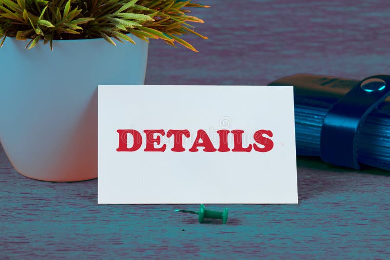 Business Concept. DETAILS Word on a Business Card on a Cold Blue ...