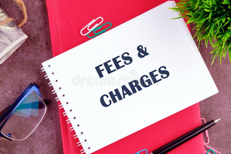 Business Concept. FEES and CHARGES Words There is a Note in the ...