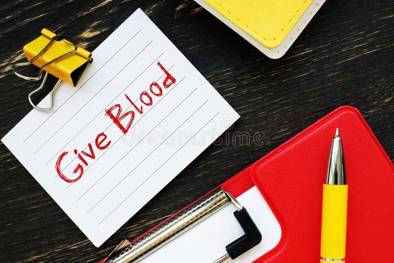 Business Concept about Give Blood with Sign on the Page Stock Image ...