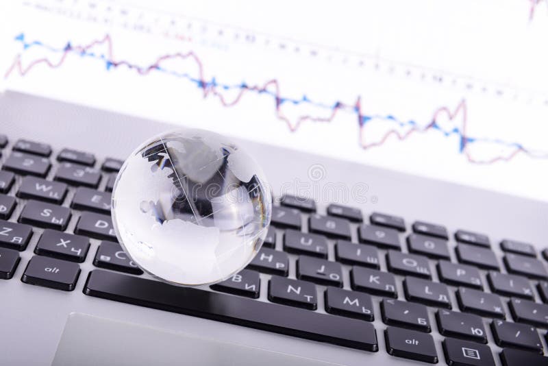 Business Concept of Glass Globe on a Laptop Keyboard Stock Image ...
