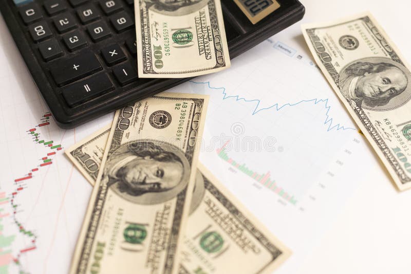 Business Concept with Graphs. a Bundle of Money on a Graph. Stock Photo ...