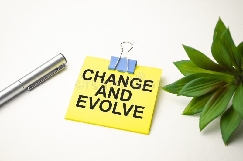 Business Concept. Notebook with Text Change and Evolve Sheet of White ... Business Concept. Notebook with Text Change and Evolve Sheet of White ...