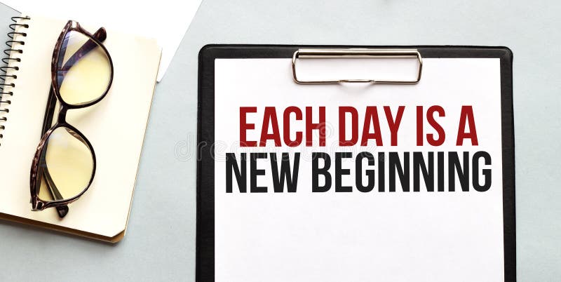 Text Each Day is a New Beginning on White Paper Plate in Businessman ...