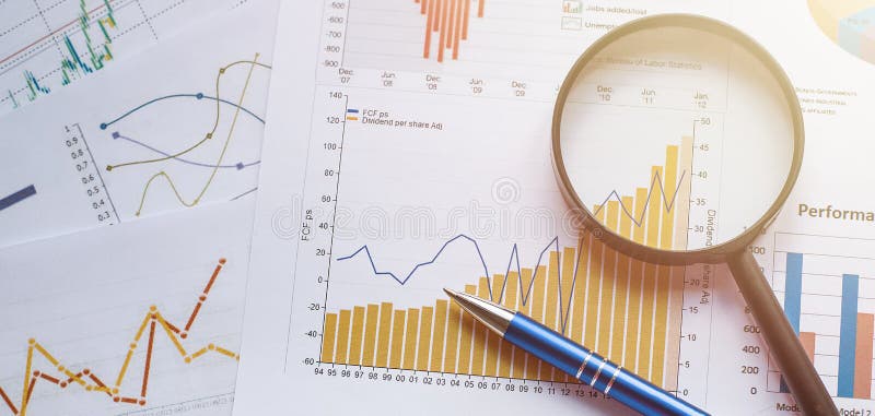 Business Concept with Pencil and Magnifying Glass on Documents ...