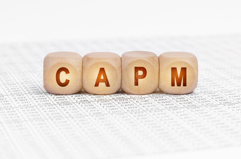 On the Table with Documents are Wooden Cubes with the Inscription ...