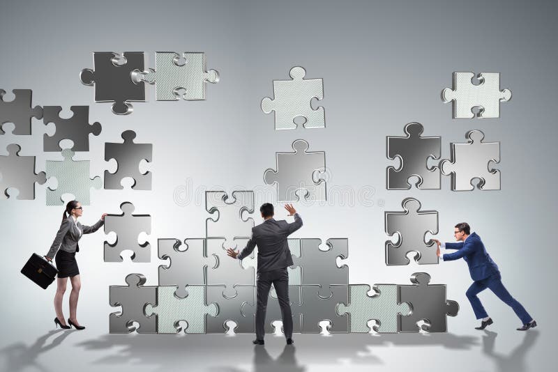 The Business Concept of Teamwork with Puzzle Pieces Stock Photo - Image ...