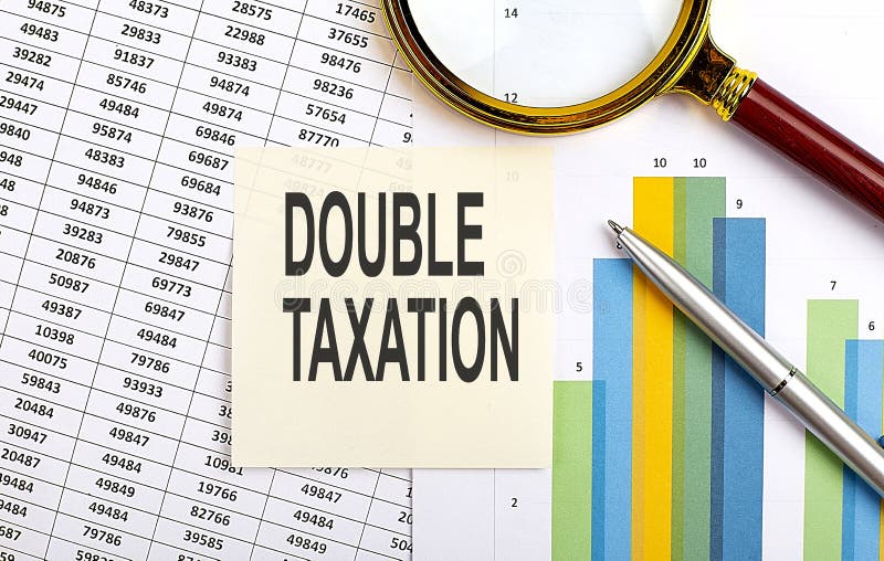 Business Concept. Top View of Stiscker with Text DOUBLE TAXATION on ...