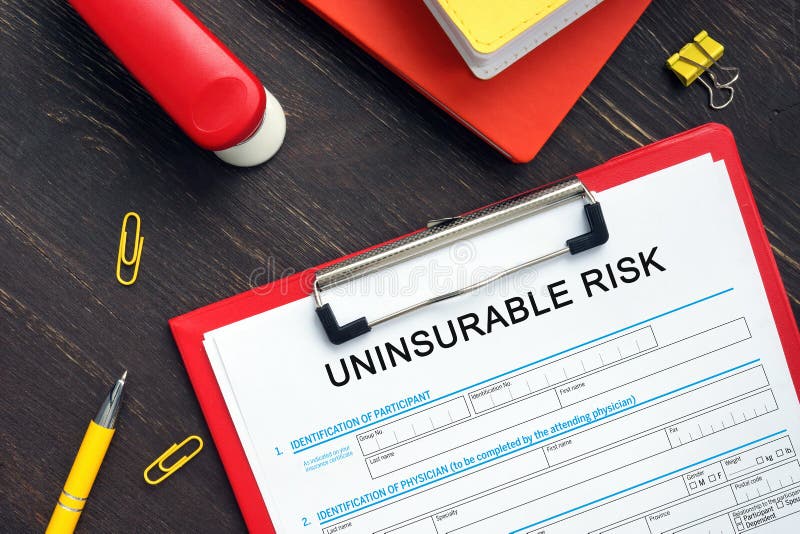 Business Concept about UNINSURABLE RISK Application Form with Sign on ...
