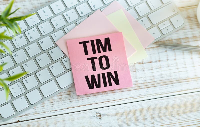 Business Concept. on a White Surface a Pencil and a Notepad with the ...