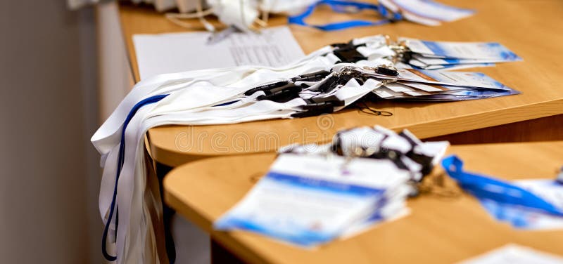 Business Conference. a Stack of Badges Lies on the Edge of the Table ...