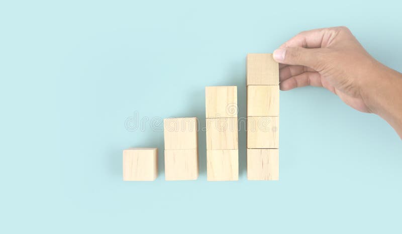 Business Connecting Piece of Multi Wood Chart Blocks Steps in Hand ...