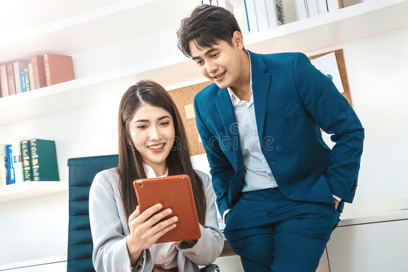 Business Couple Checking Work with Tablet on the Office Stock Photo ...