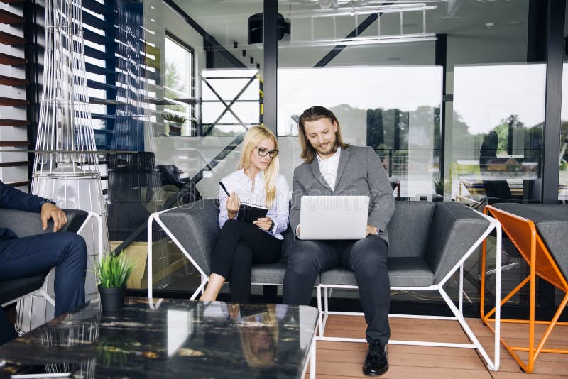 Business Couple Working Together on Project at Modern Startup of Stock ...