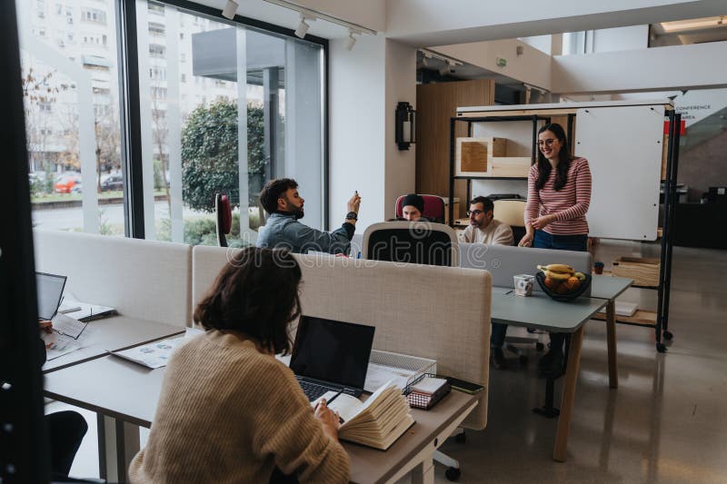 Business Coworkers Collaborating on a Successful Project in an Indoor ...
