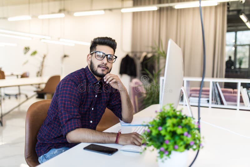 Business and Creative People Concept. Young Indian Man with Laptop ...